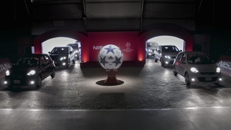 Nissan vehicles compete during an innovative soccer match as part of ...